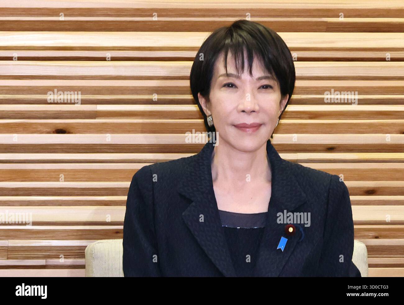 Japanese Prime Minister Sanae Takaichi attenda the cabinet meeting at ...