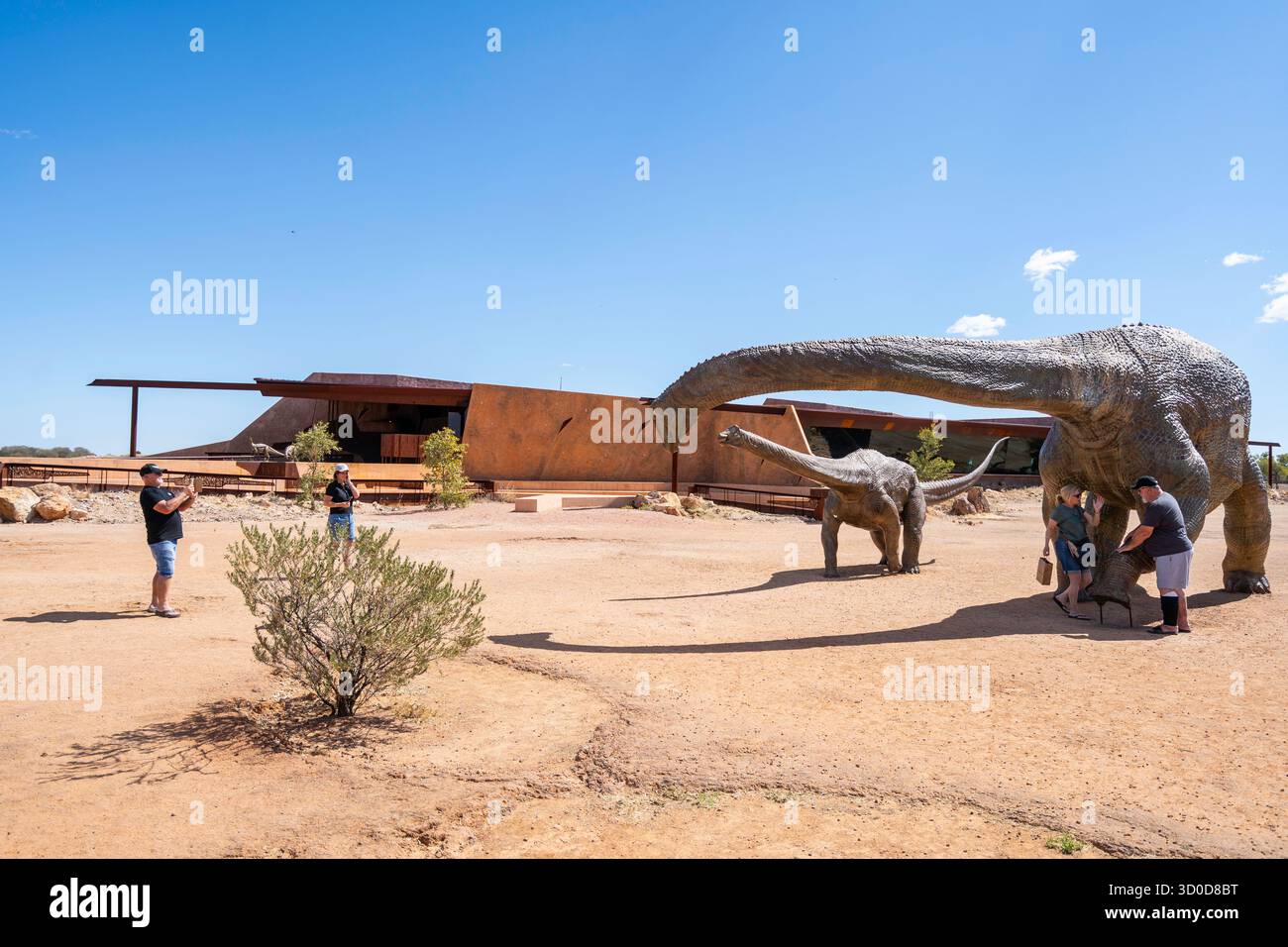Bronze statues of sauropods and coelurosaurs outside the "March of the ...