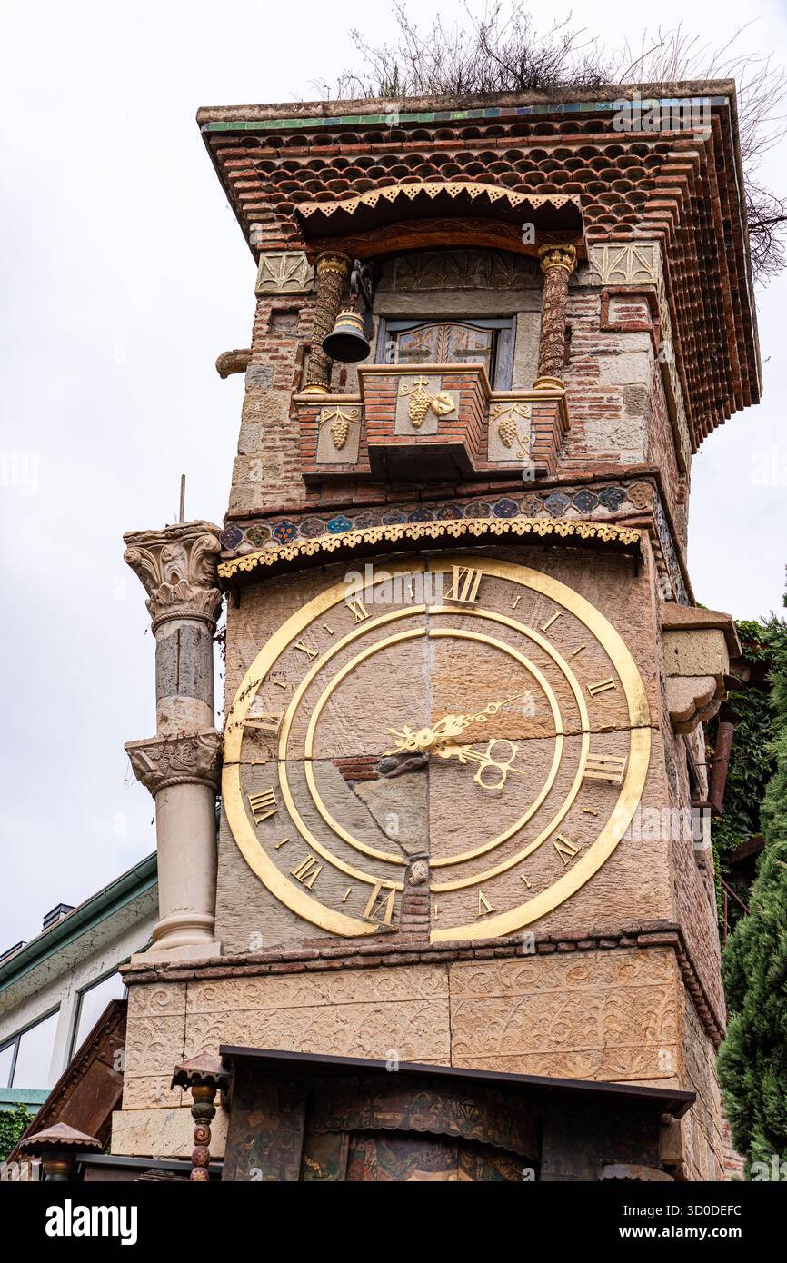 Falling clock tower in Old Tbilisi Stock Photo - Alamy