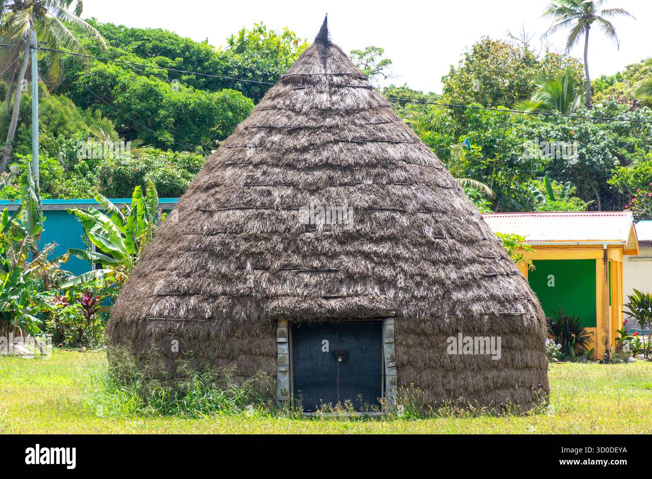 Traditional round hut of the Kanak people, Luecila, Lifou Island, New ...