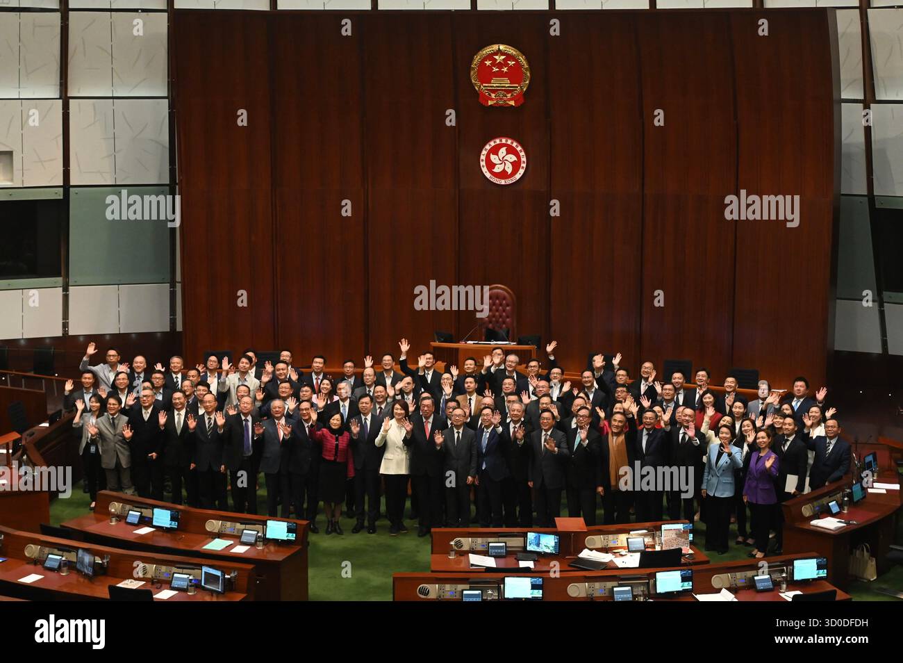 Lawmakers posing for a group photo inside the chambers of the ...