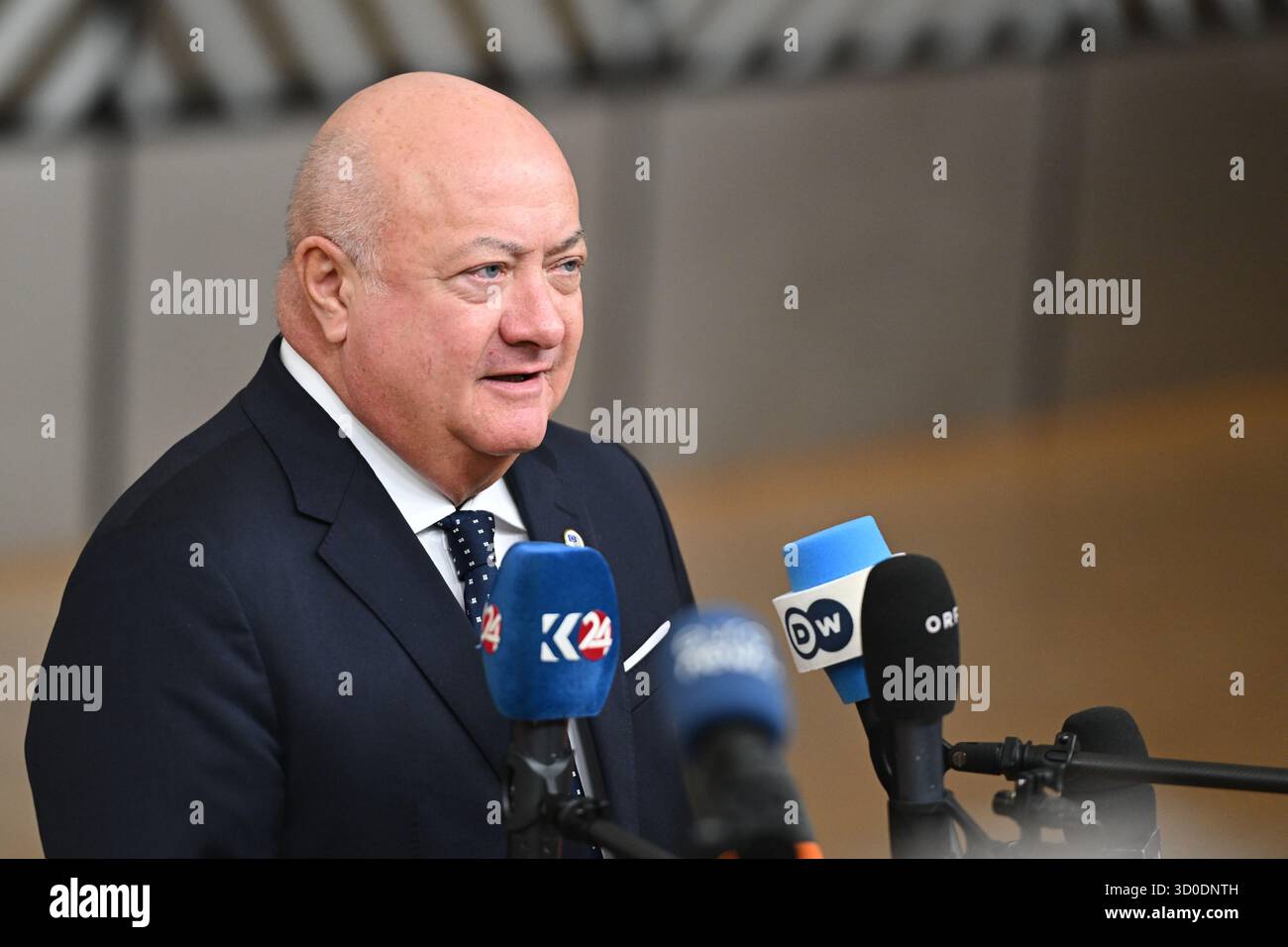 Austria's Chancellor Christian Stocker speaks with the media as he ...