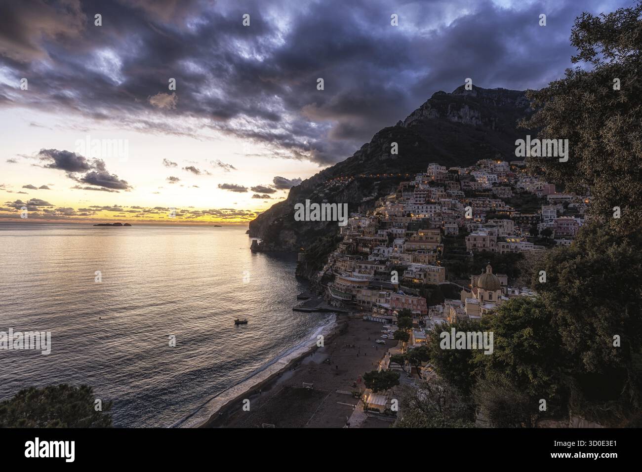 Sunset view over Positano a small coastal beach enclave village located ...