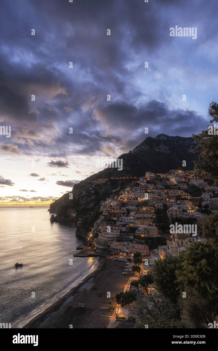 Sunset view over Positano a small coastal beach enclave village located ...