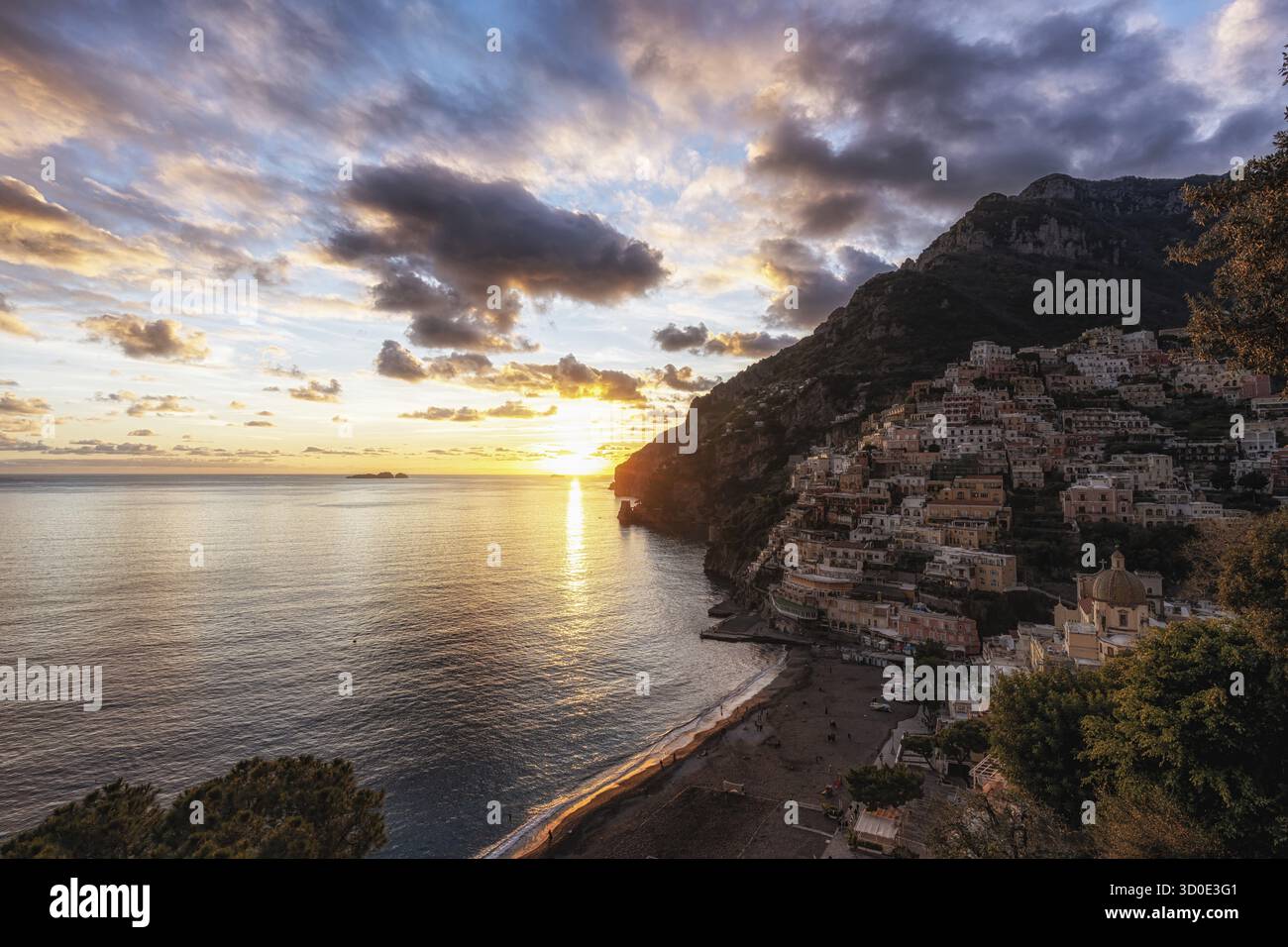 Sunset view over Positano a small coastal beach enclave village located ...