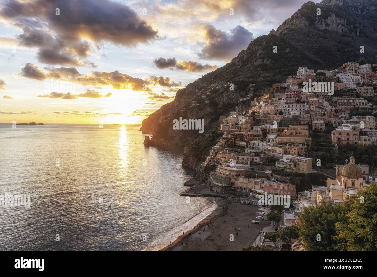 Sunset view over Positano a small coastal beach enclave village located ...