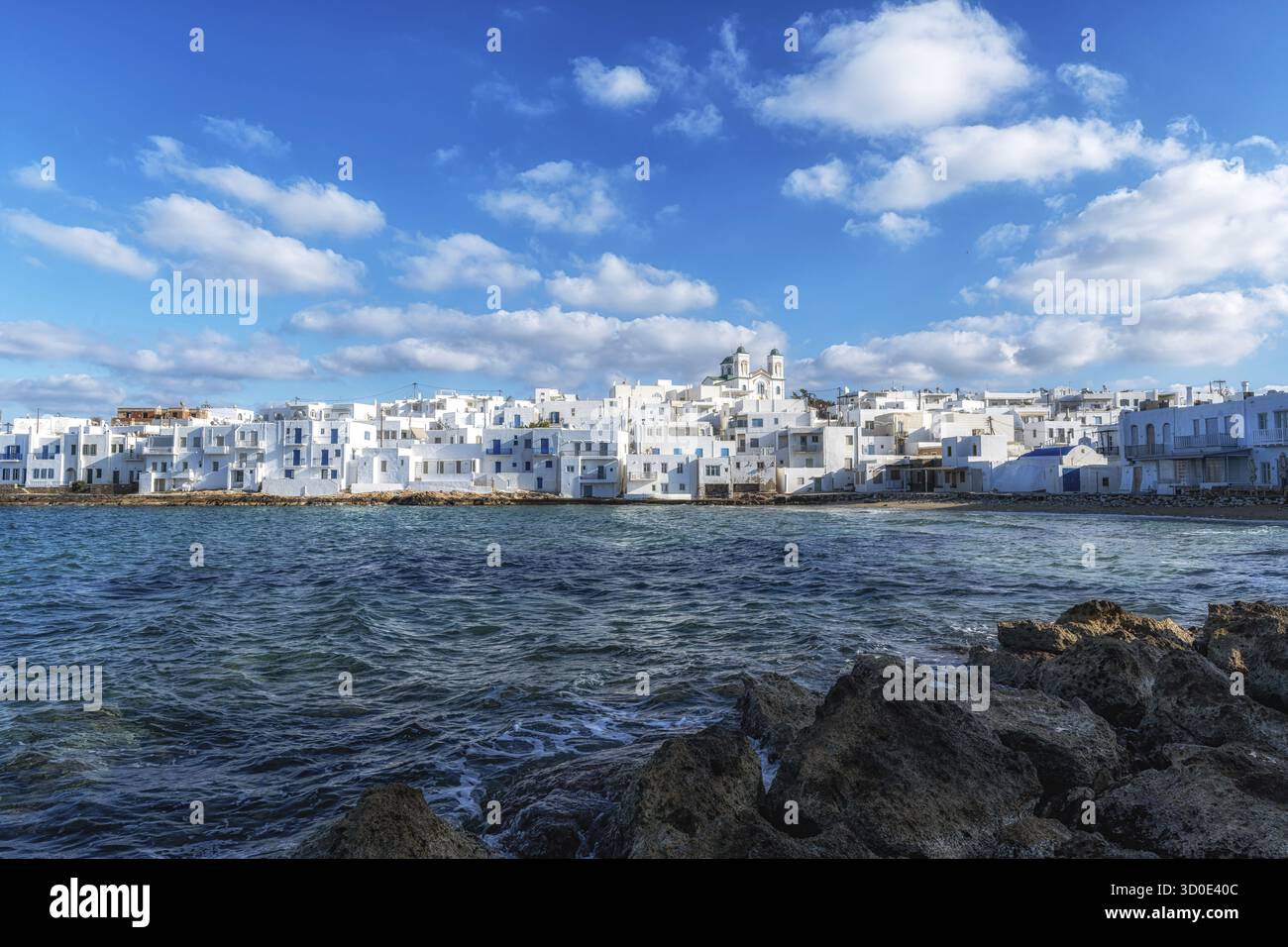 Naousa Beach and surrounding white color painted houses. Famous tourist ...