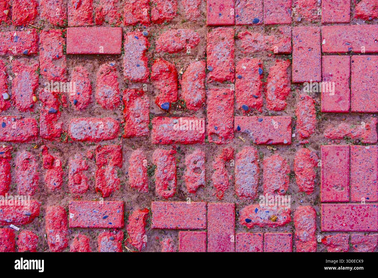 Worn footpath walk textured in red brick blocks floor above view. Red ...
