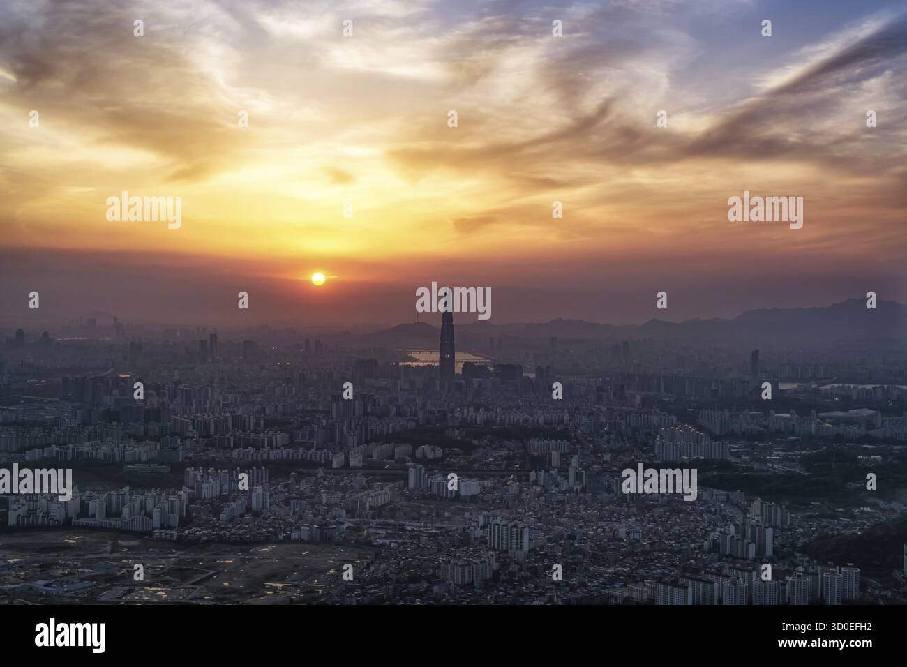 Sunset over the hazy dusty sky in Seoul with fine dusts covering up the ...