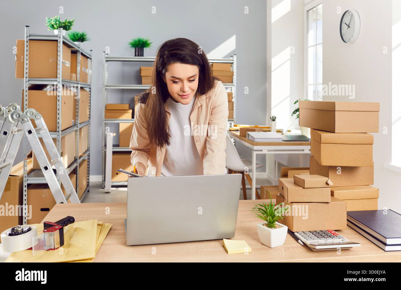 Woman conducting parcel inventory hi-res stock photography and images ...