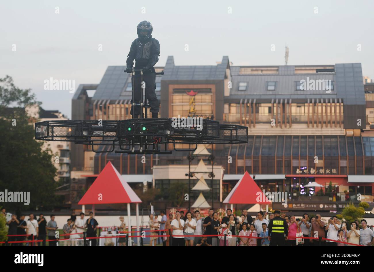A man demonstrates a low-altitude aircraft at Wushan Square in Hangzhou ...