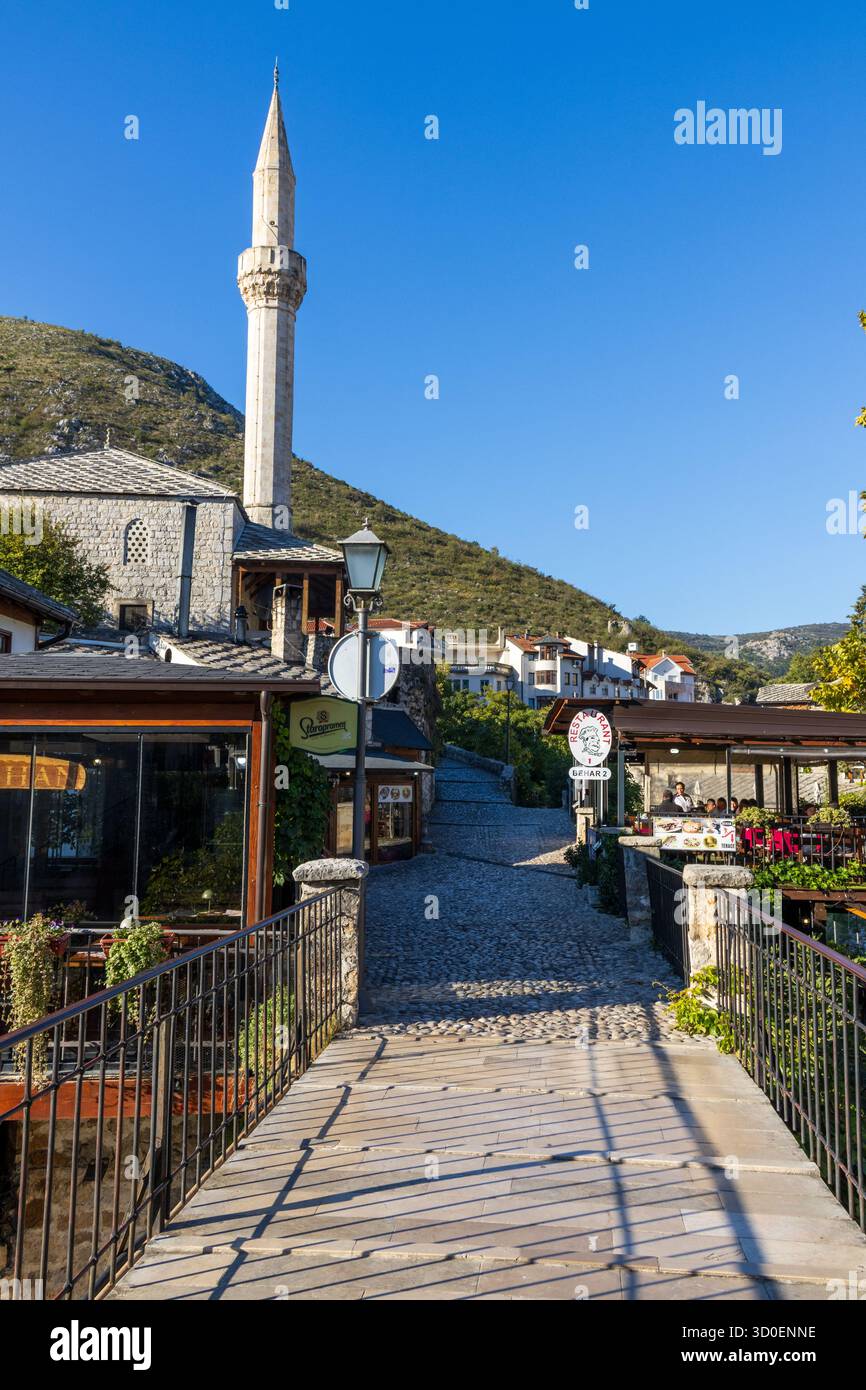 A classic street scene in the old town of Mostar in Bosnia and ...