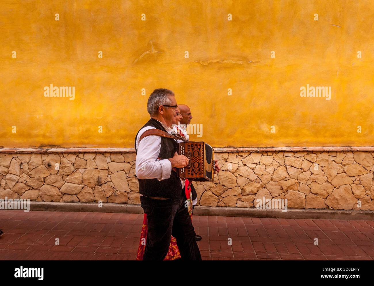Musician playing a traditional accordion during a Sardinian folk parade ...