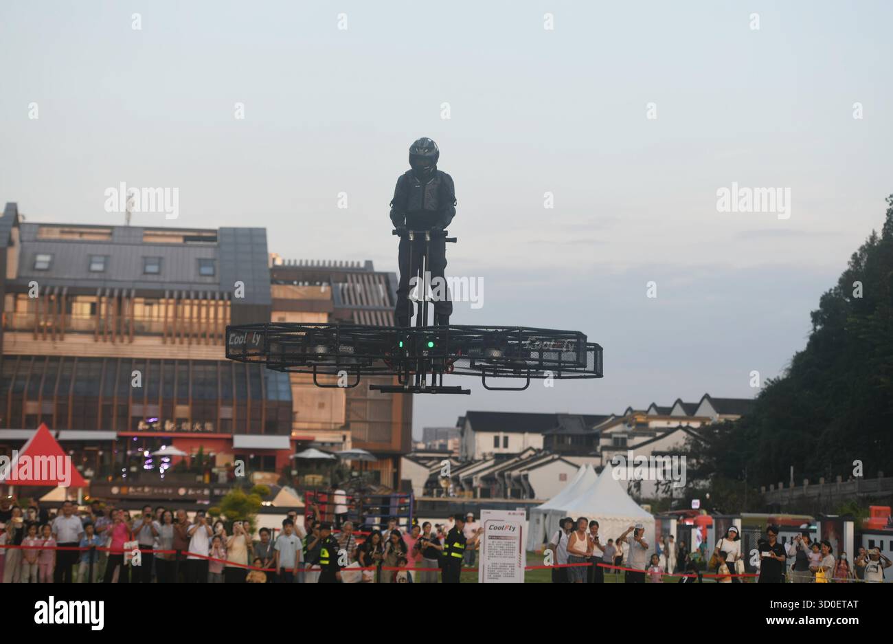 A man demonstrates a low-altitude aircraft at Wushan Square in Hangzhou ...