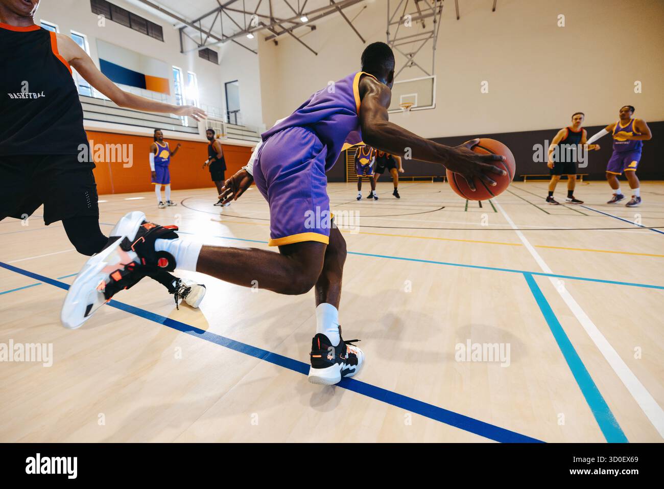 A high-energy basketball game showing players passing, dribbling, and ...