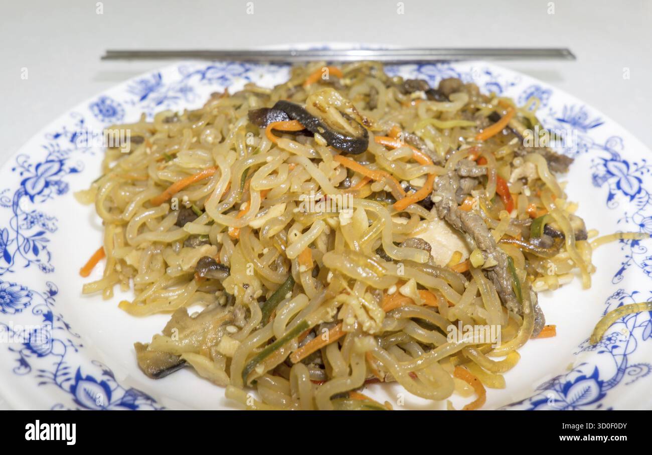 Traditional korean dish called japchae which is made from sweet potato ...