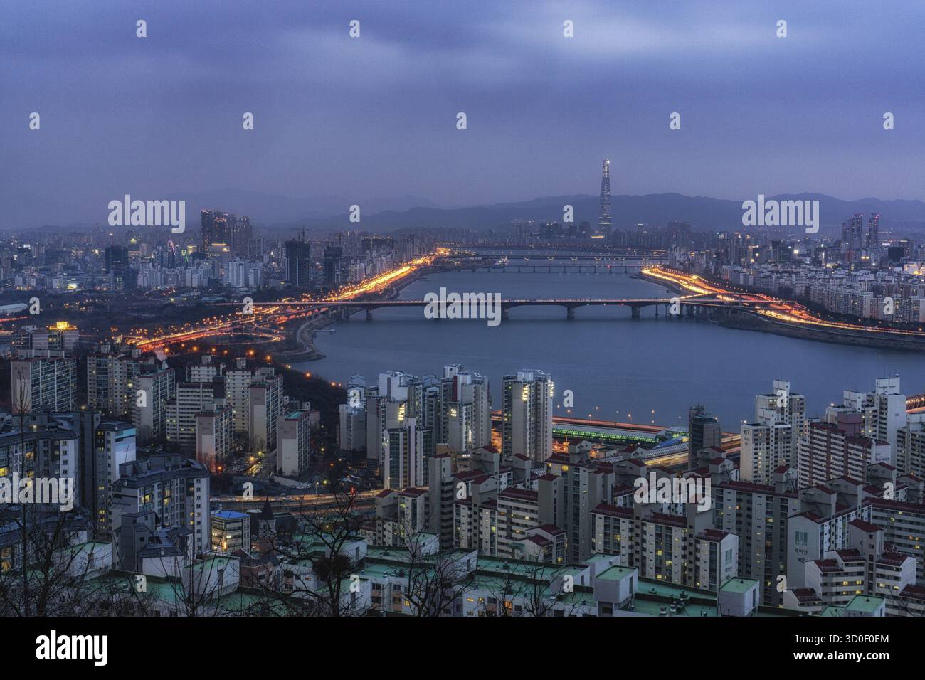Hazy night view over han river on top of eungbongsan mountain viewpoint ...