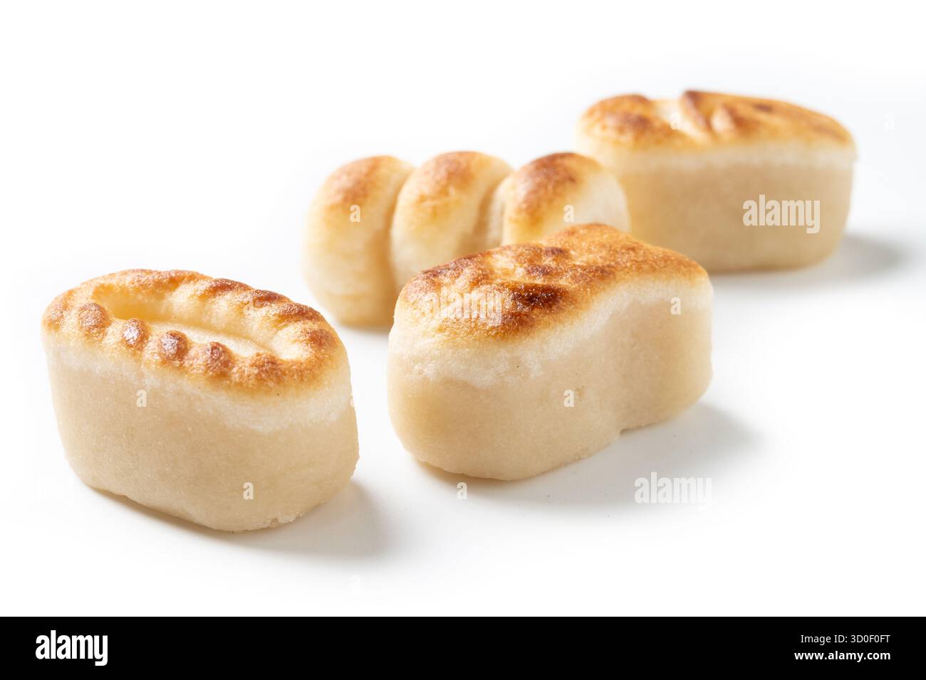 Traditional Spanish mantecados and marzipan dessert isolated on white ...