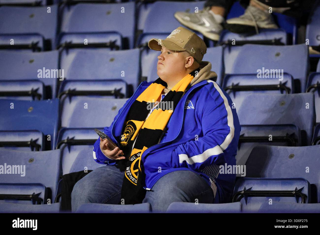 Sheffield, UK. 22nd Oct, 2025. Sheffield Wednesday fan in the black and ...