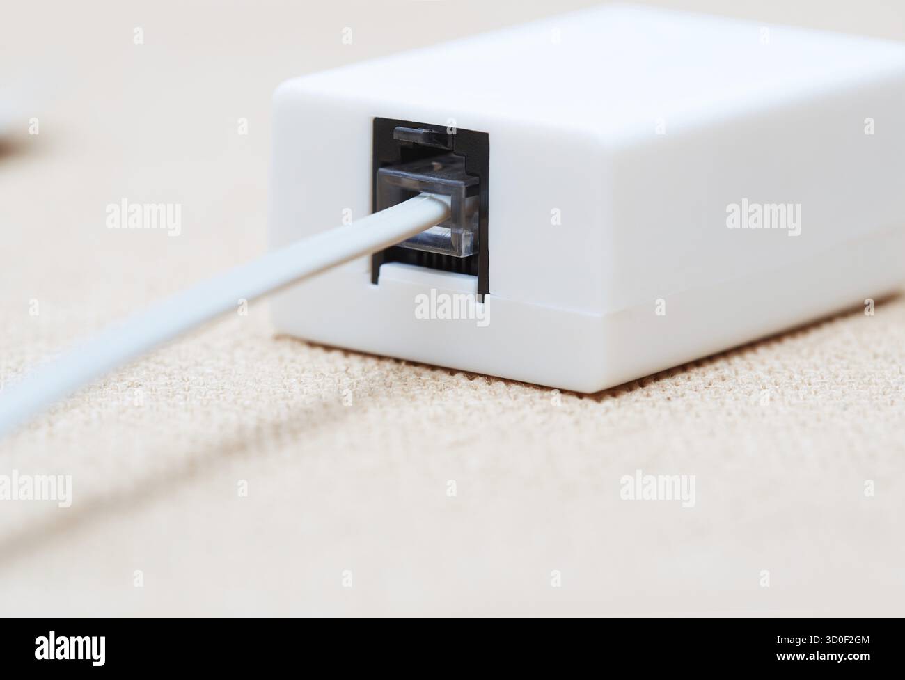 Network cable in the splitter. Close-up view Stock Photo - Alamy