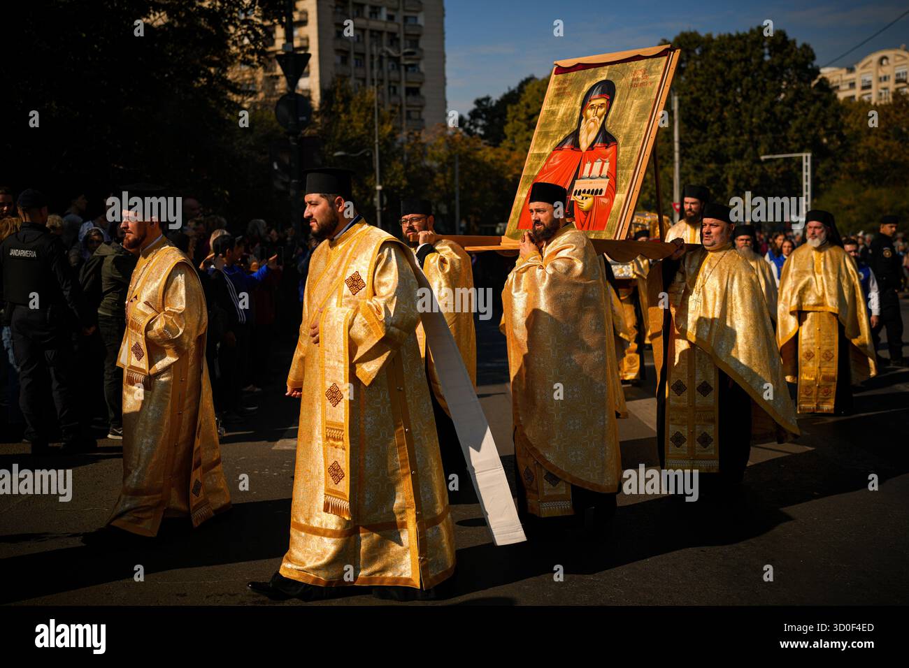 Orthodox priests carry a religious icon of Saint Dimitrie Bassarabov ...