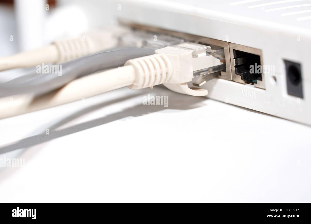 Network modem with cables. Close-up horizontal photo Stock Photo - Alamy