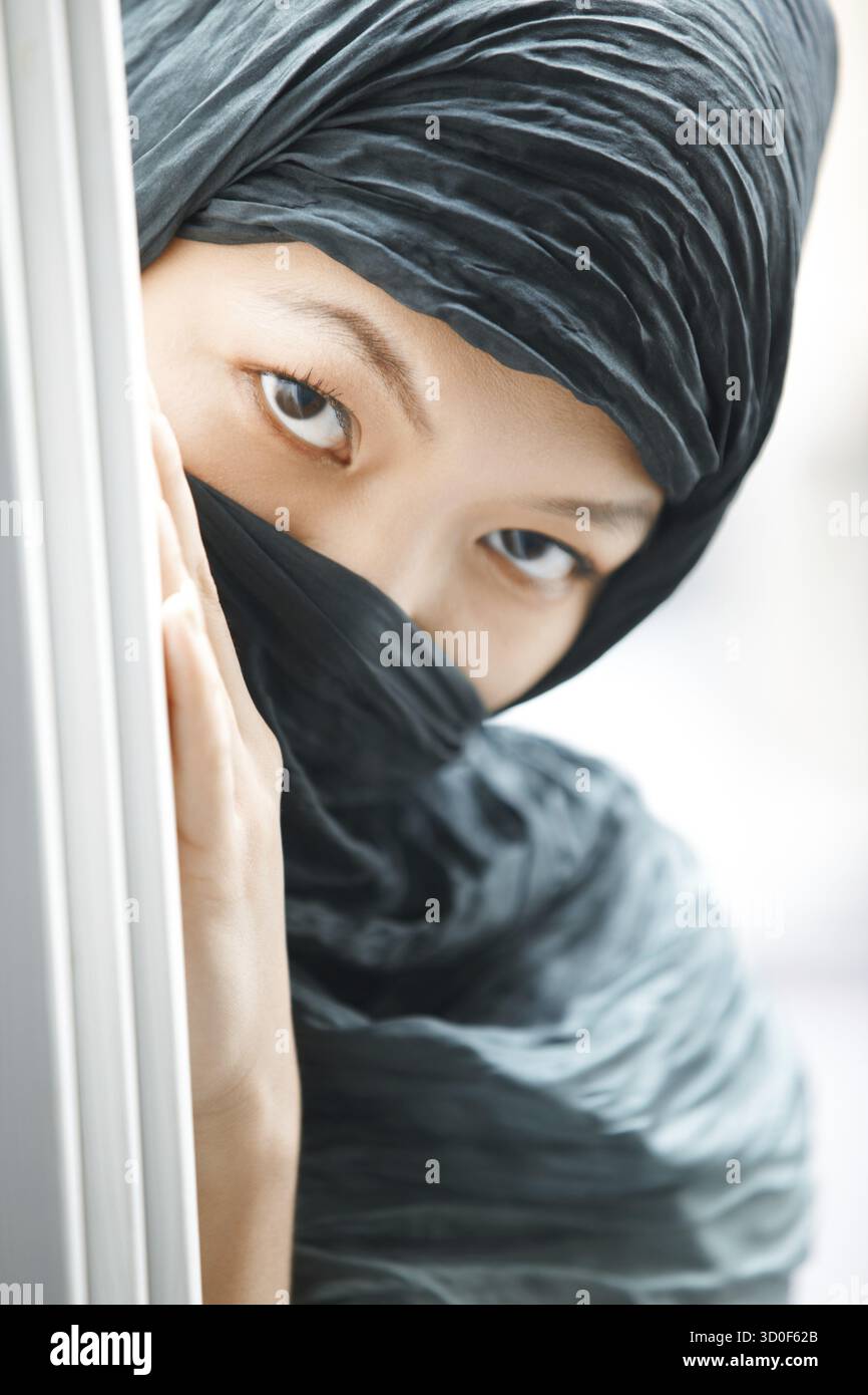 Black lady in hijab hi-res stock photography and images - Alamy