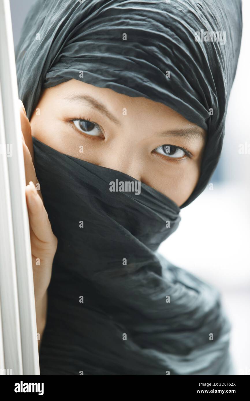 Black lady in hijab hi-res stock photography and images - Alamy
