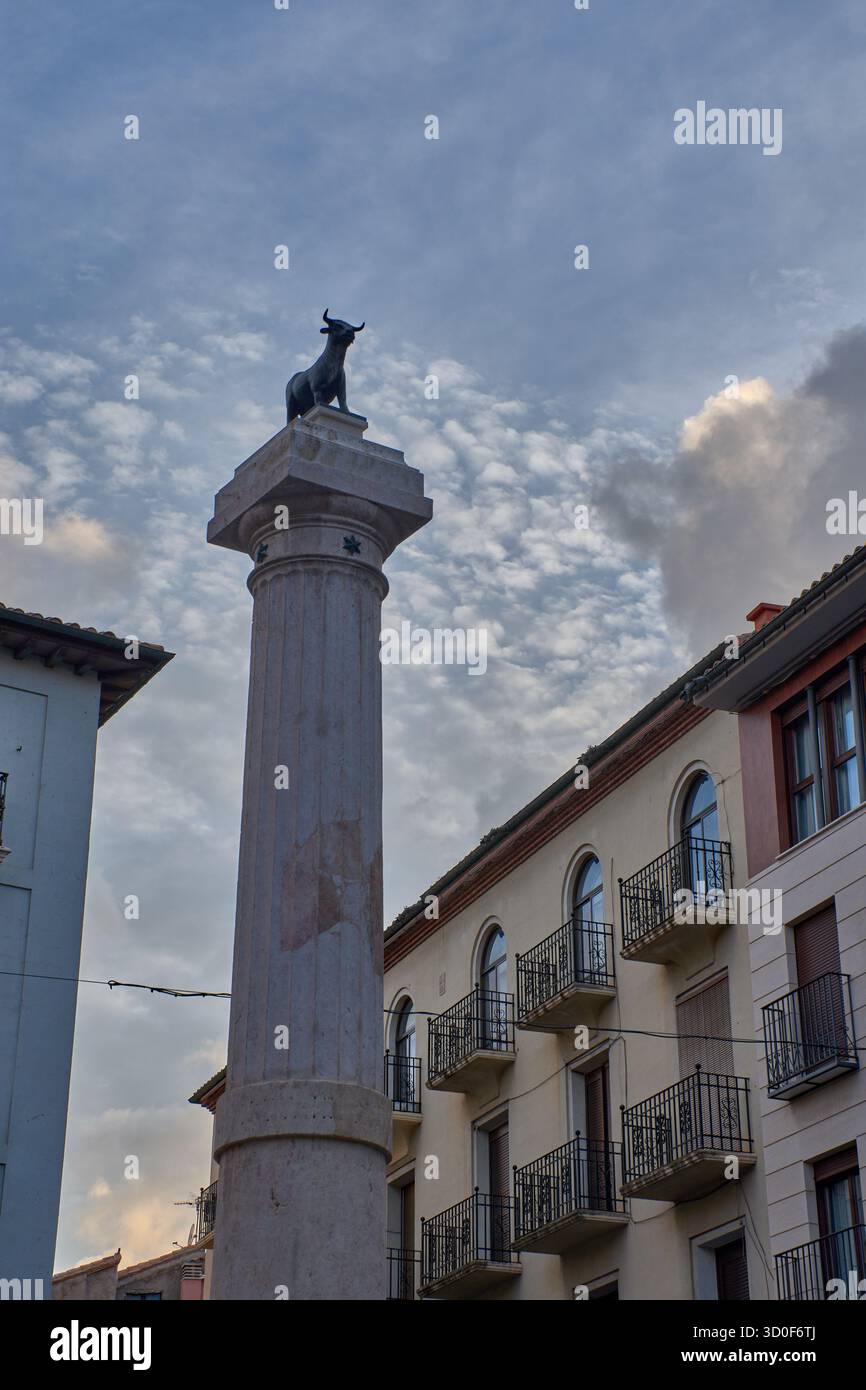 The iconic monument of El Torico de Teruel stands atop a tall stone ...