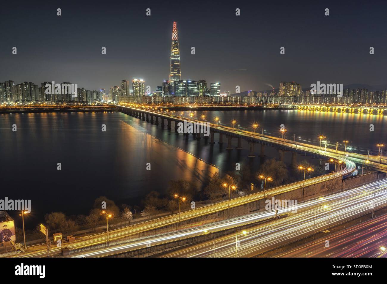 The iconic lotte tower taken at night with the view of jamsil railway ...