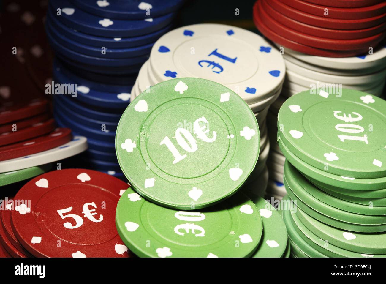 Stack of European casino chips. Close-up photo Stock Photo - Alamy