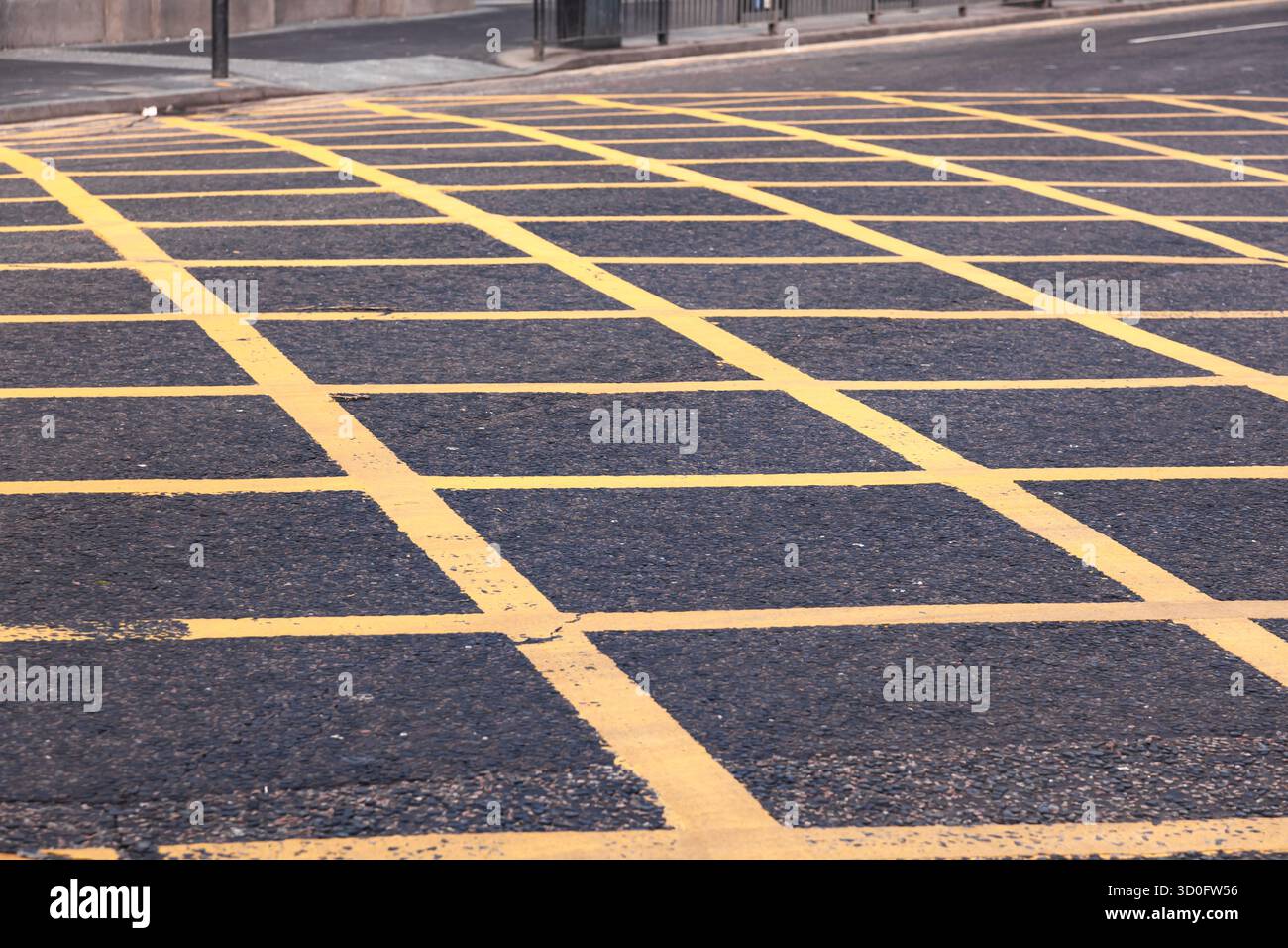 Asphalt road with checkered markings Stock Photo - Alamy