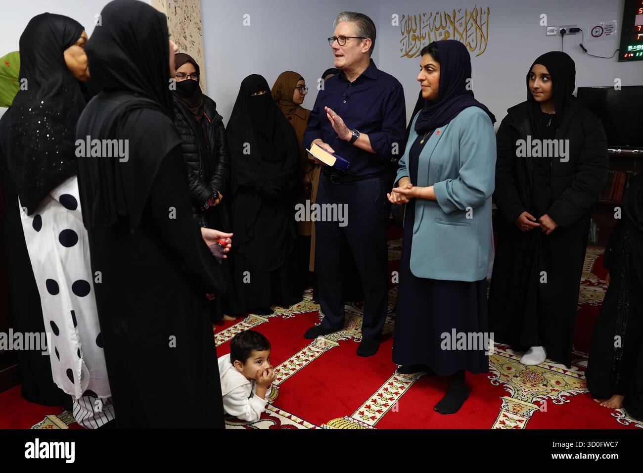 Britain's Prime Minister Keir Starmer, centre left, and Home Secretary ...