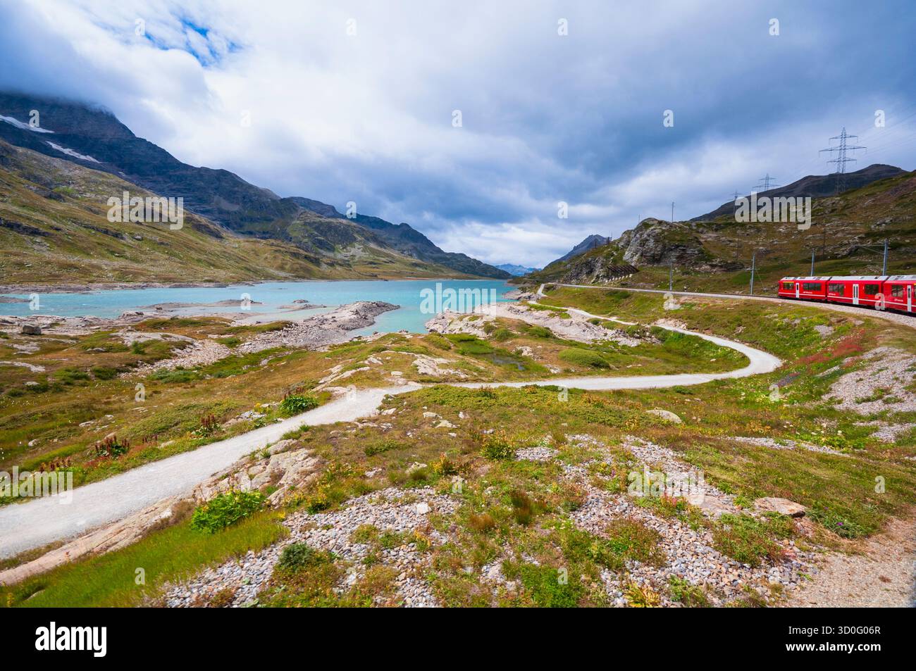 Switzerland, Bernina Express Railway Train with Lago Bianco Lake Stock ...