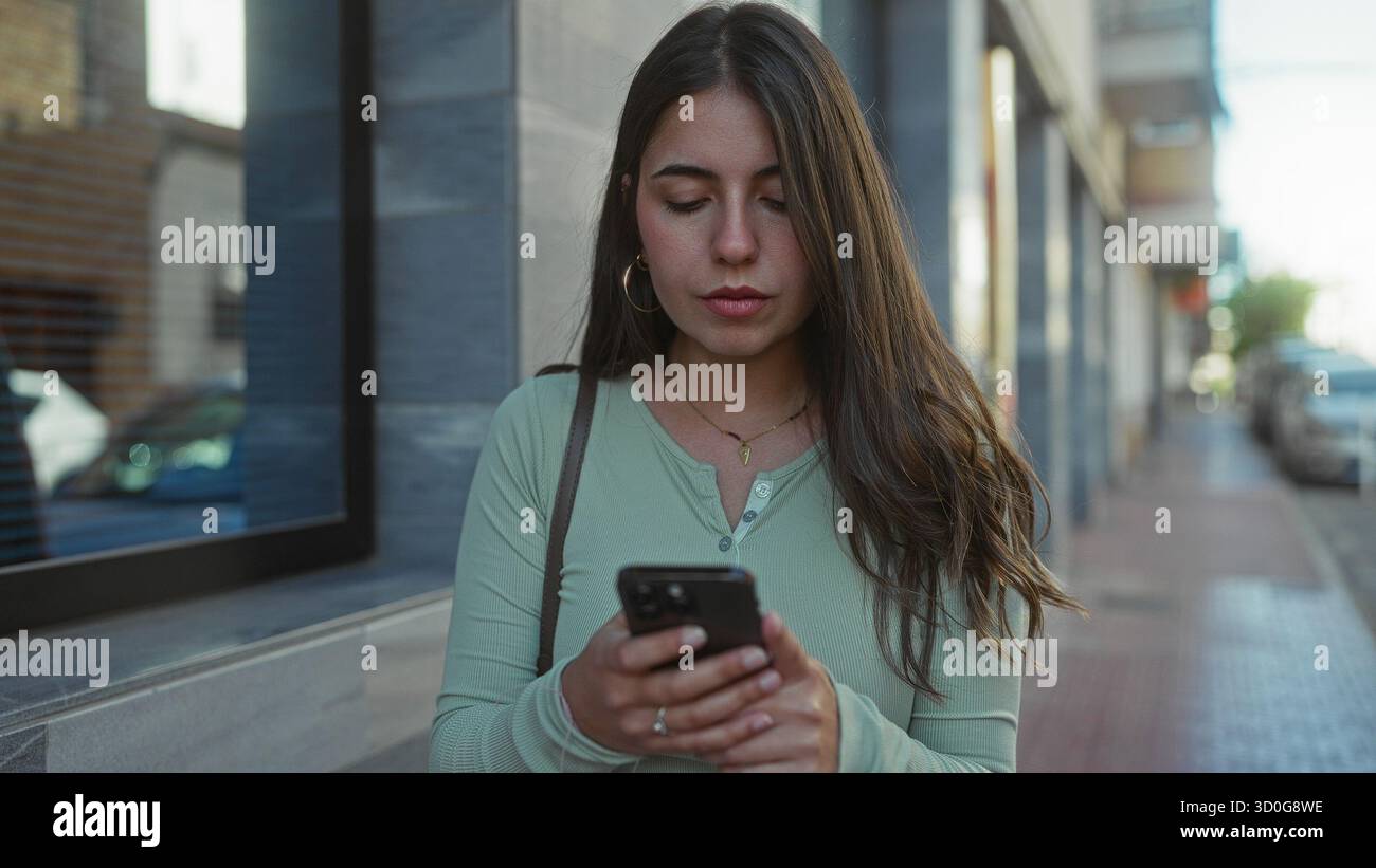 Female engaging smartphone amidst hi-res stock photography and images ...