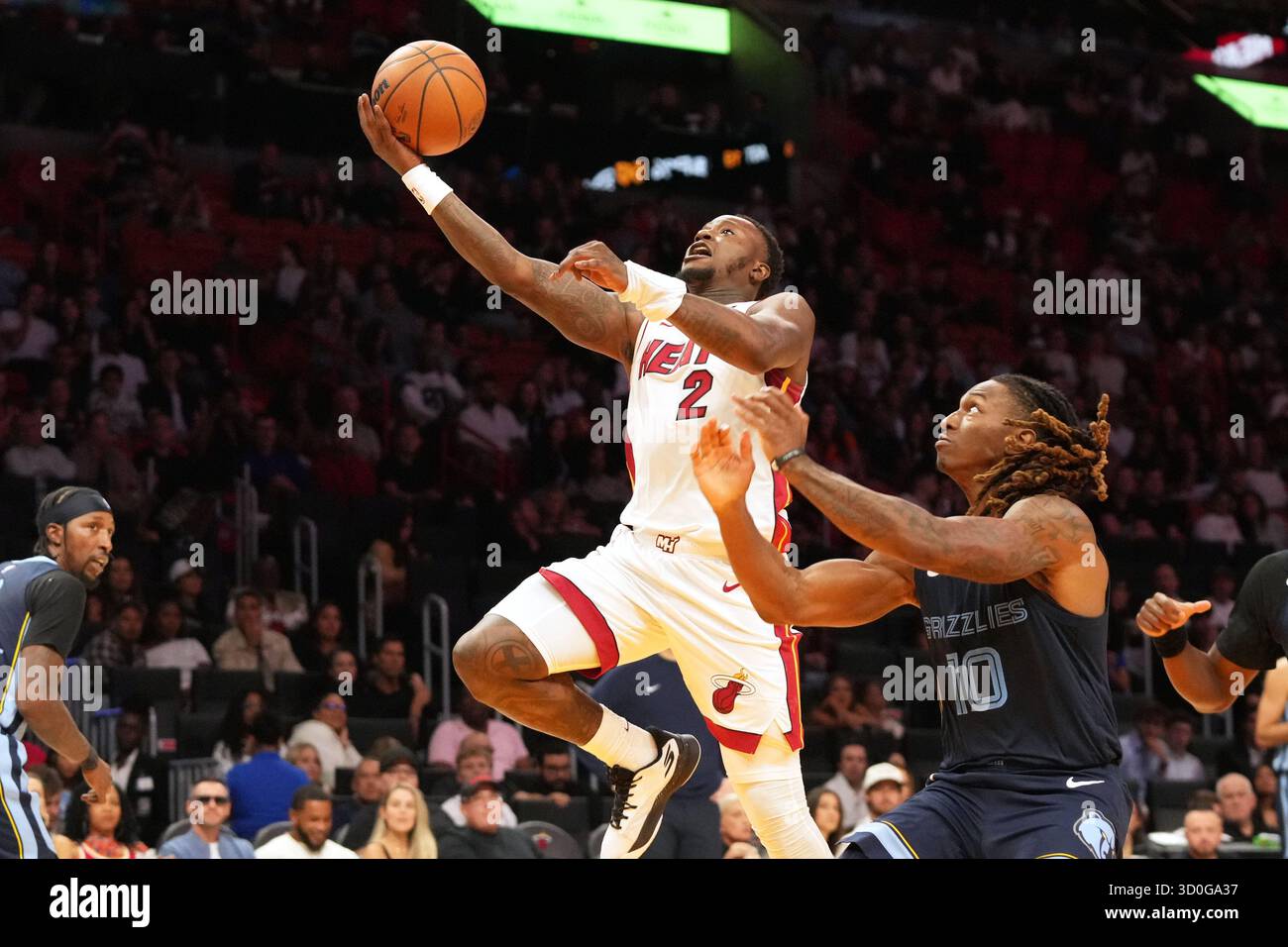 FILE - Miami Heat guard Terry Rozier (2) drives to the basket as ...