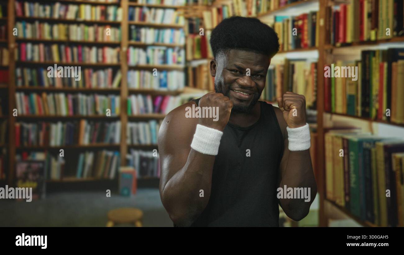 Man flexing muscular arm and clenching fists with white wristbands in ...