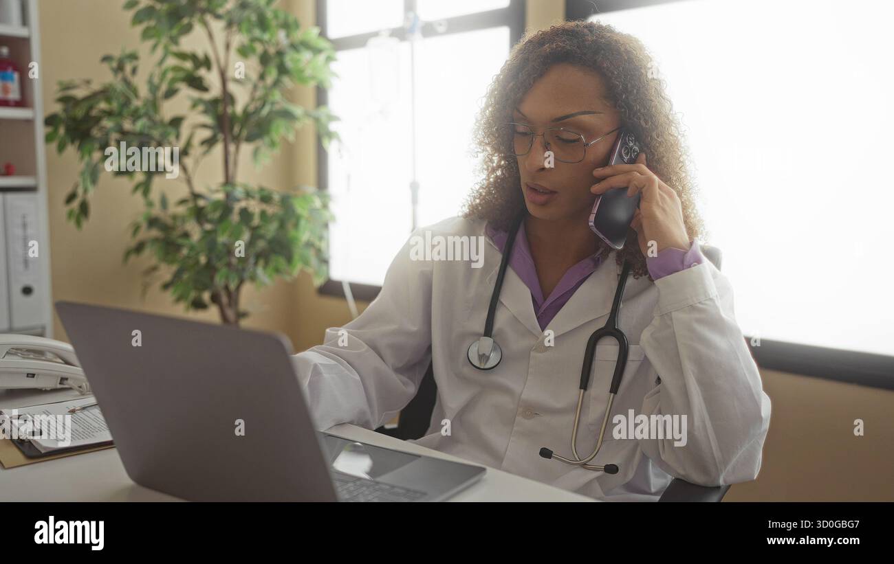 Transgender woman doctor wearing stethoscope holds phone to ear and ...