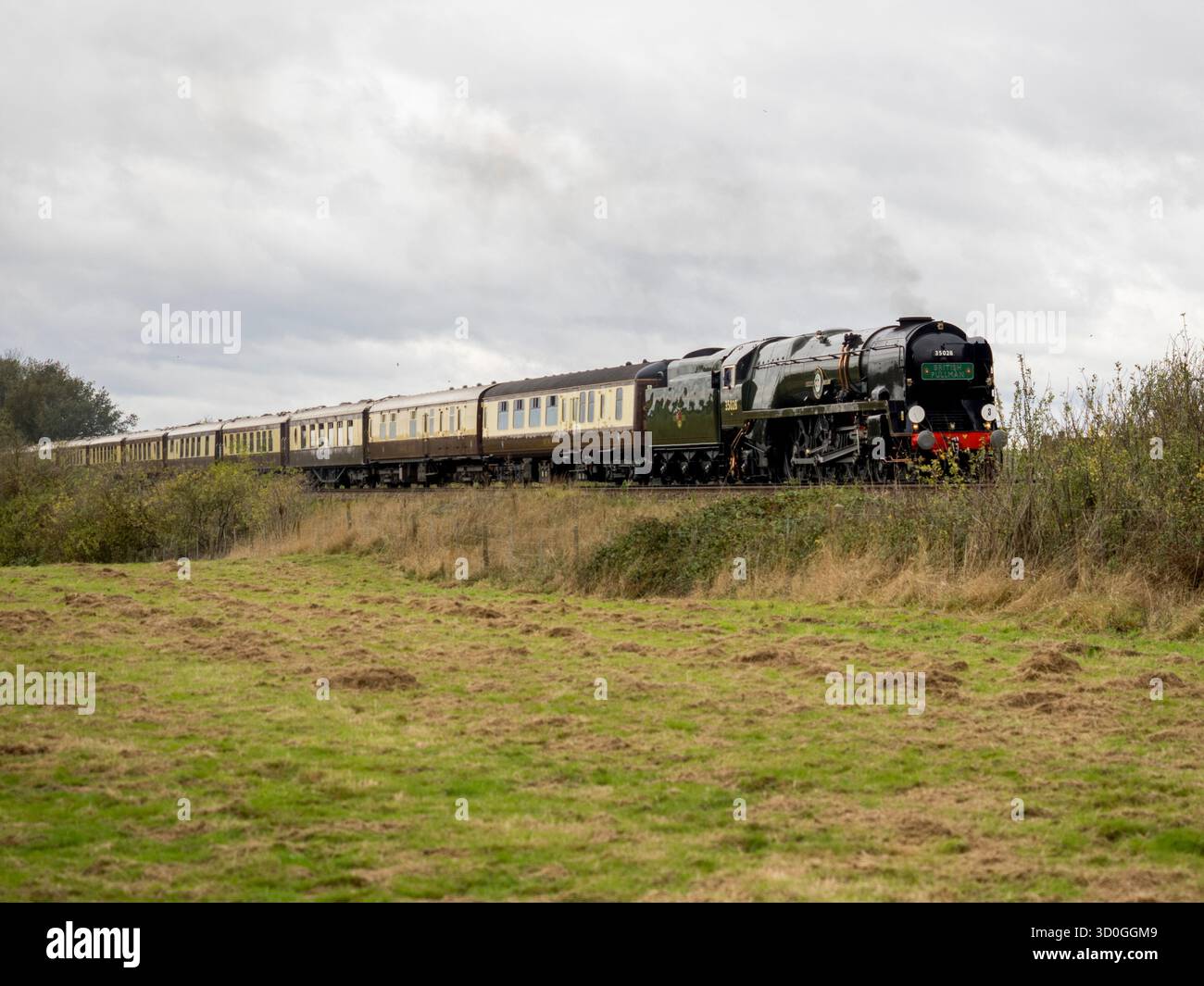 Teynham, Kent, UK. 23rd Oct, 2025. Steam train Clan Line seen passing ...