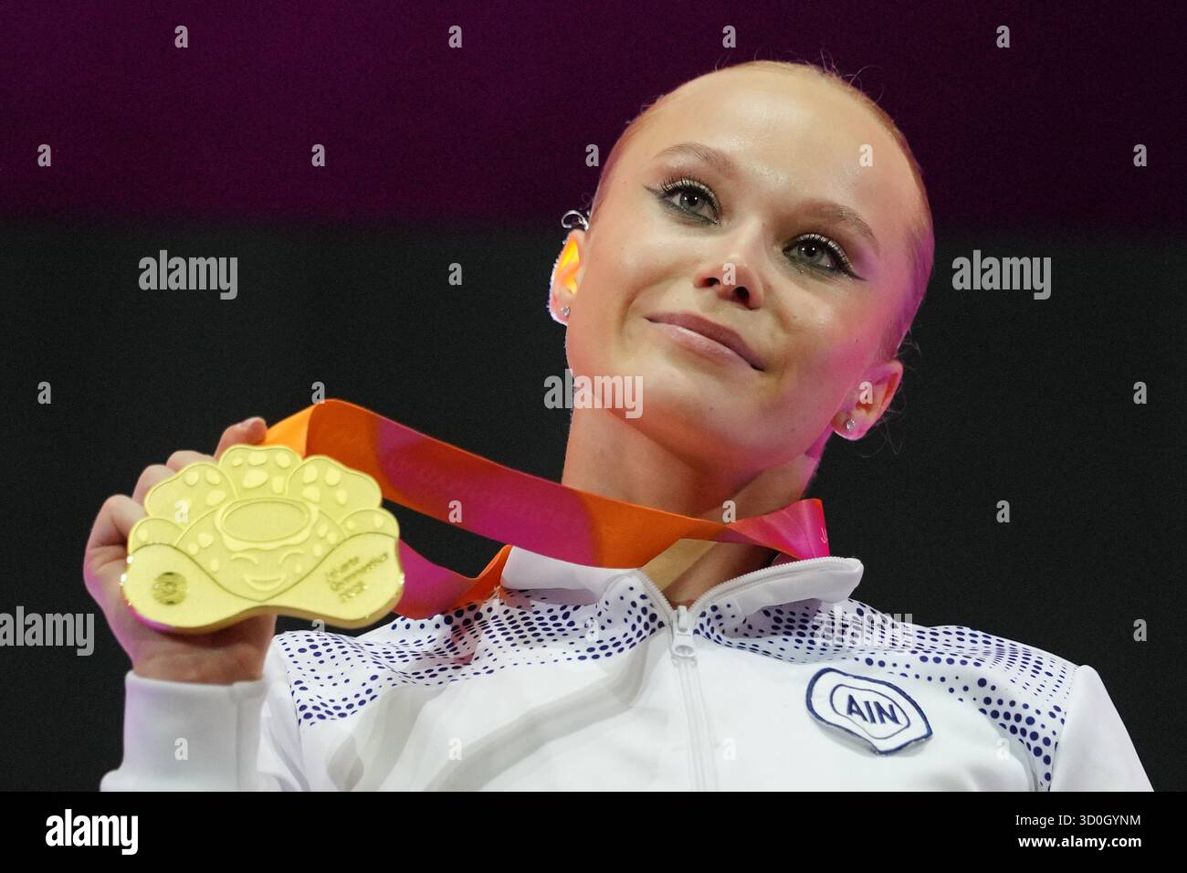 Individual Neutral Athlete Angelina Melnikova holds the gold medal ...