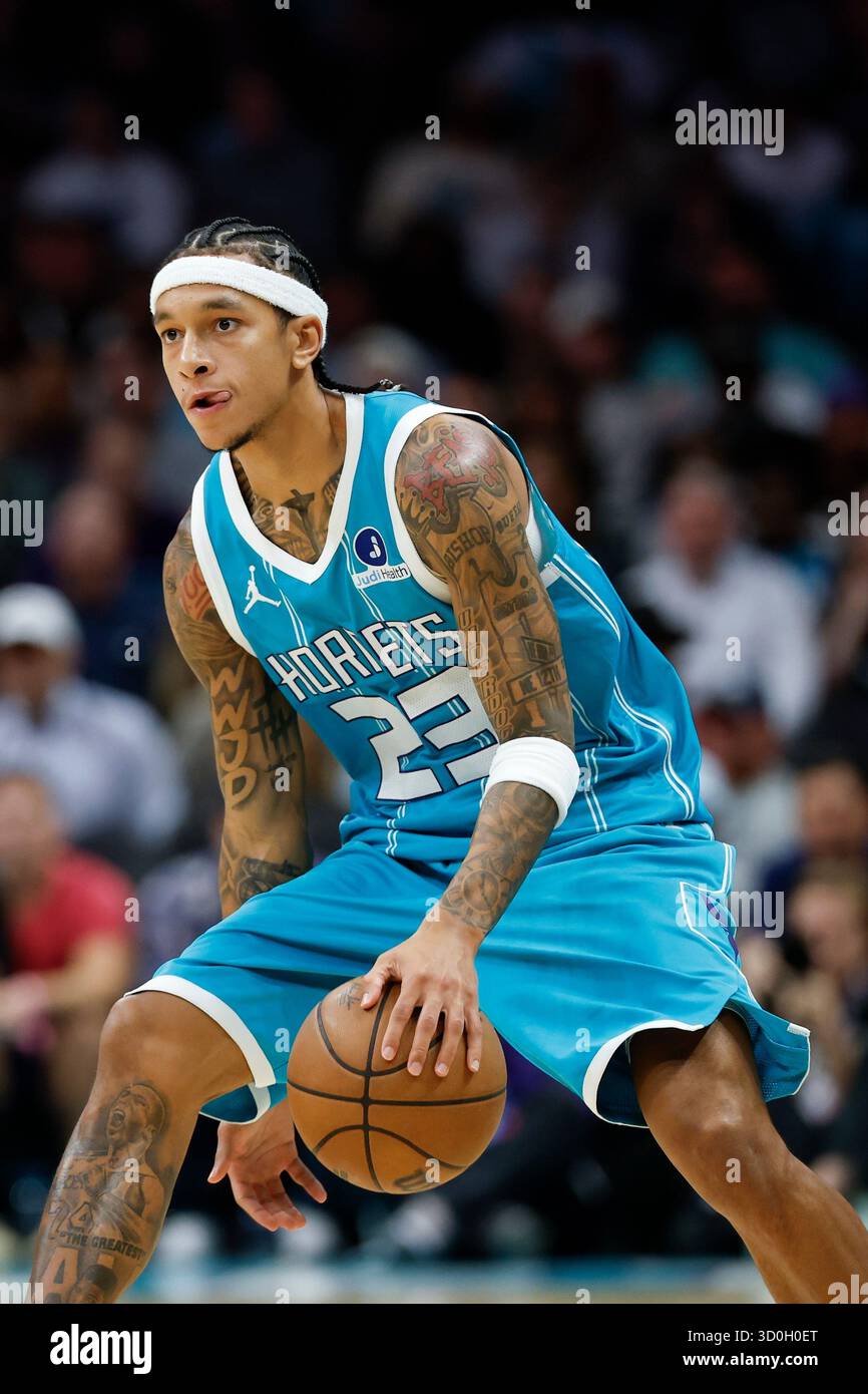 Charlotte Hornets guard Tre Mann runs the offense during the first half ...