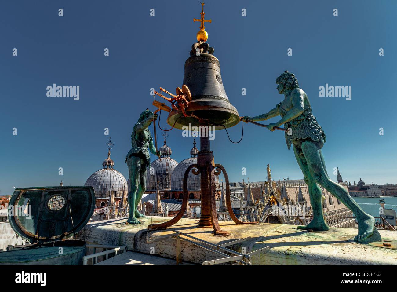 Bell striking statues hi-res stock photography and images - Alamy