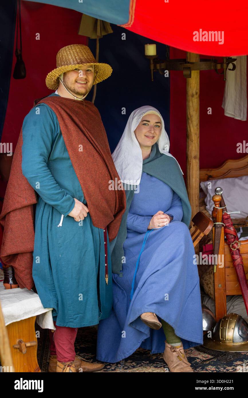 Two medieval re-enactors in medieval costume Stock Photo - Alamy