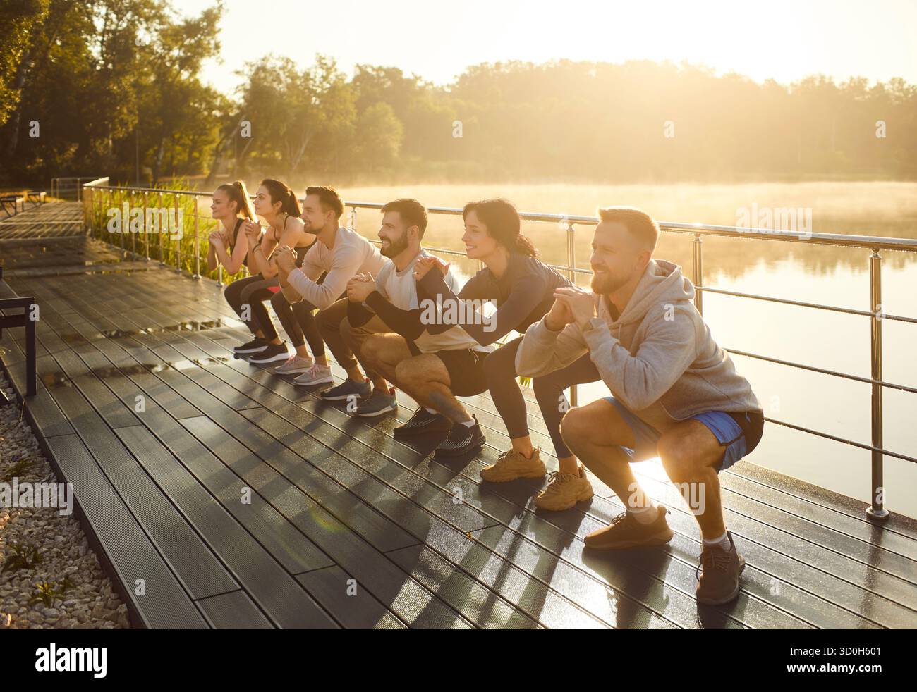 Group people doing exercise city hi-res stock photography and images ...