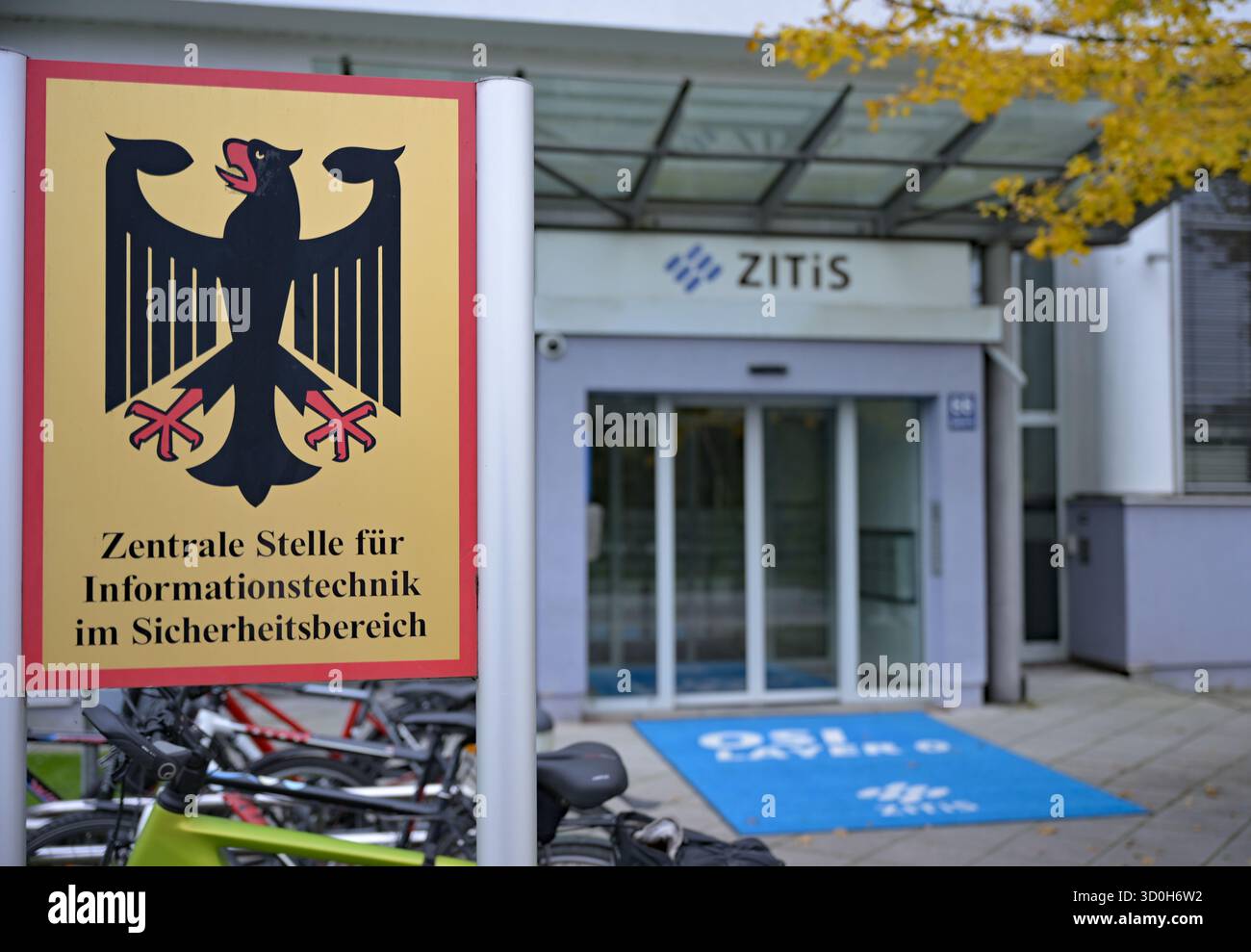 20 October 2025, Bavaria, Munich: A sign with a federal eagle stands in ...