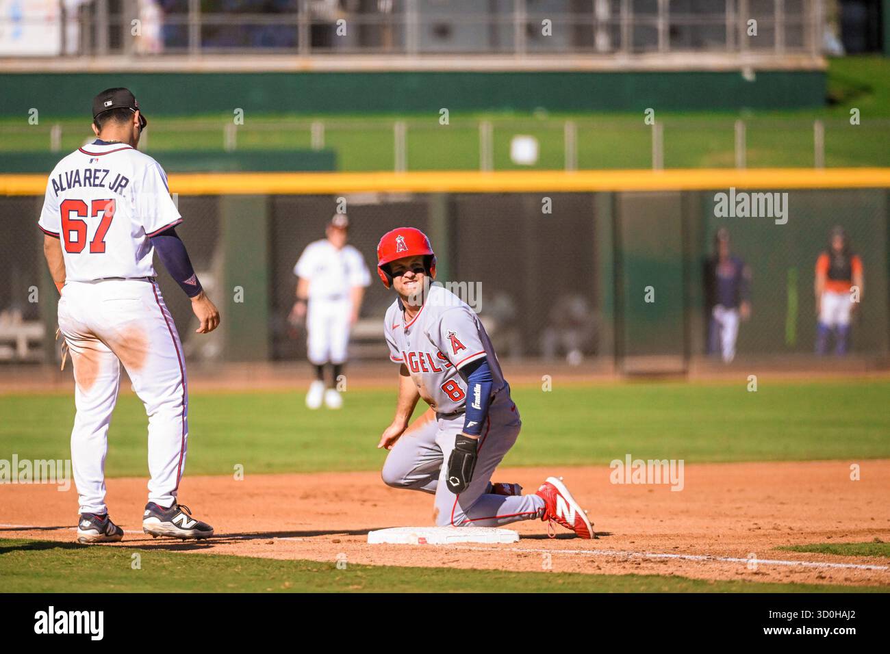 Salt River Rafters shortstop Davis Mershon (8) steals third base in the ...