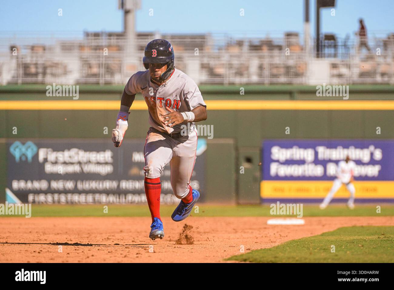 Salt River Rafters second baseman Stanley Tucker (18) steals third base ...