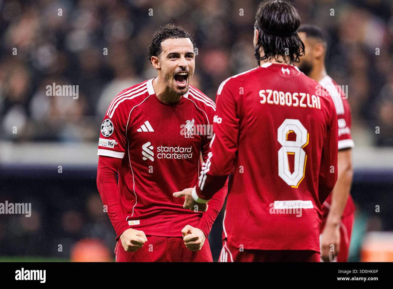 Dominik Szoboszlai of Liverpool (R) celebrating his goal with his ...