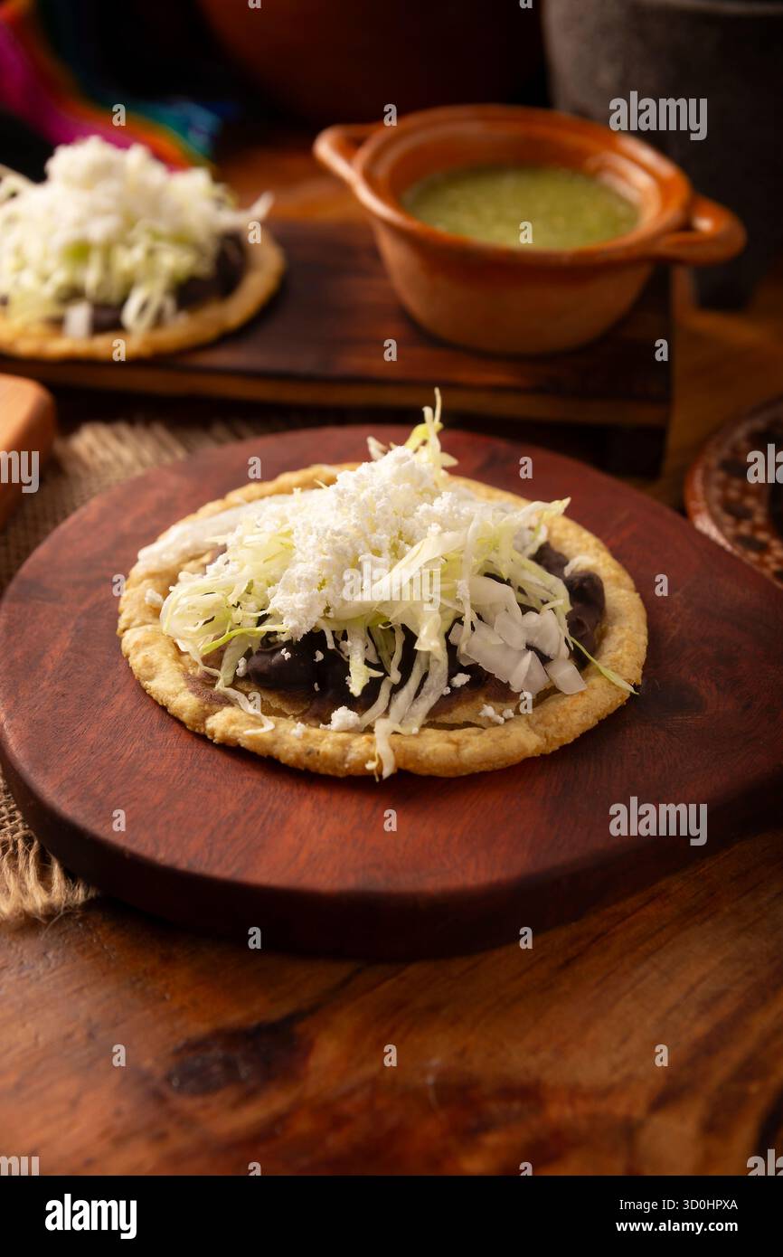Sopes. Mexican typical food prepared with flattened fried corn dough ...