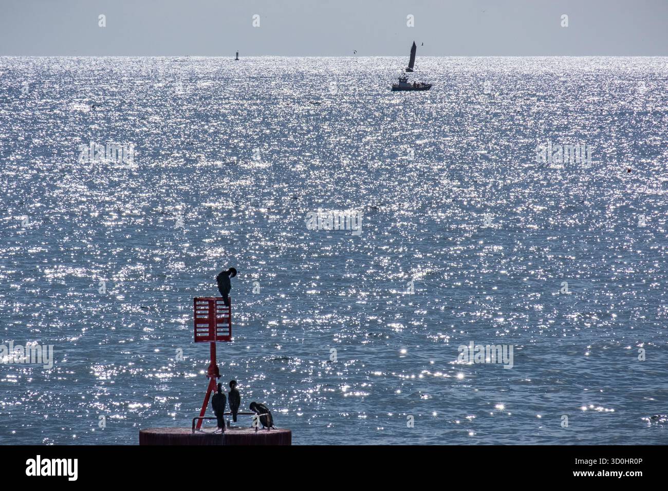 Seascape sunset buoys in hi-res stock photography and images - Alamy